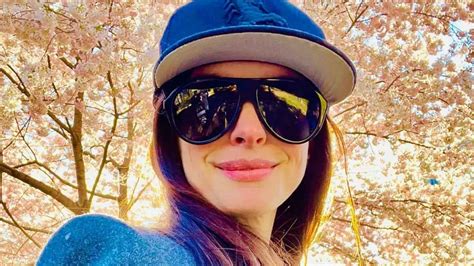 Anne Hathaway Nearly Spills Out Of Plunging Bottega Veneta Top For