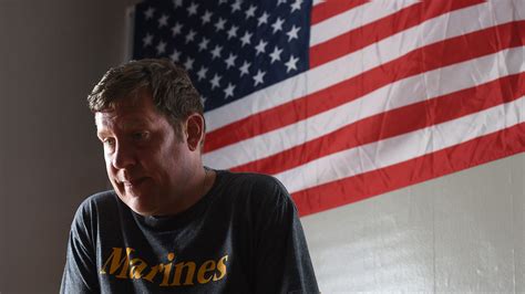 Marine Veteran Removes Unserviceable Flags From Shelby Memorial