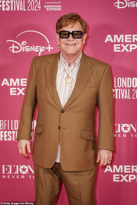 Sir Elton John Wears His Old Kneecap As A Necklace As He Turns Heads At
