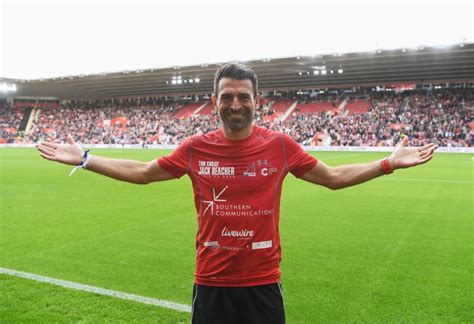 Southampton Legend Francis Benali Picks Up Wwii Bomb Found In His