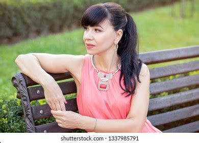 118543 Beautiful 40 Year Old Woman On Bench Royalty Free Images Stock