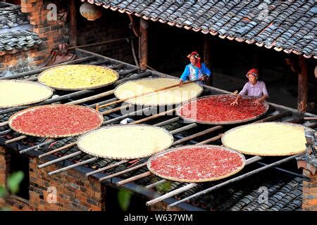 Chinese Villagers Dry Hot Peppers Corns Chrysanthemum Flowers And