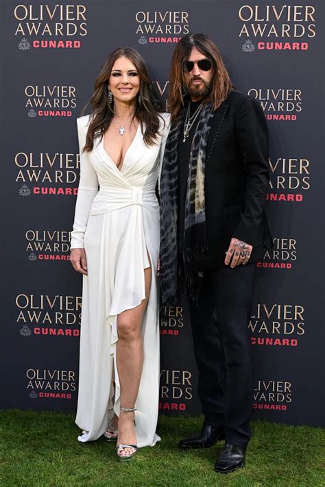 Billy Ray Cyrus And Elizabeth Hurley Spark Engagement Rumors With Huge