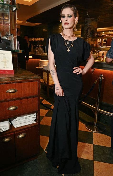 Kelly Osbourne Makes Head Turning Appearance In Waist Cinching Dress