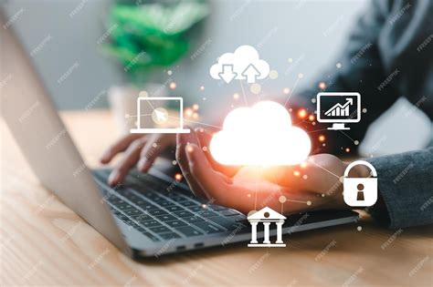 Premium Photo A Man Uses A Laptop While Holding A Diagram Of Cloud Computing Cloud Computing