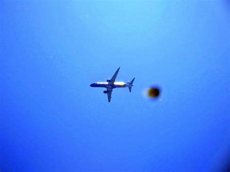 Large Sphere Captured Trailing Behind Passenger Plane By Johnmooner