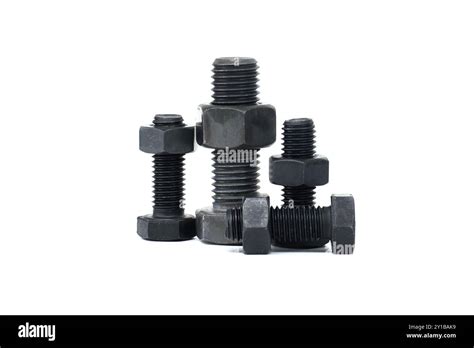 Assorted Metal Bolts And Nuts On A White Background Ideal For