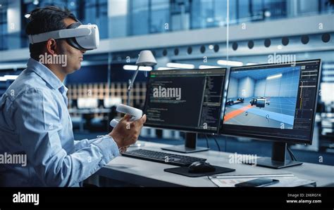 industrial software developer writing code and testing automotive