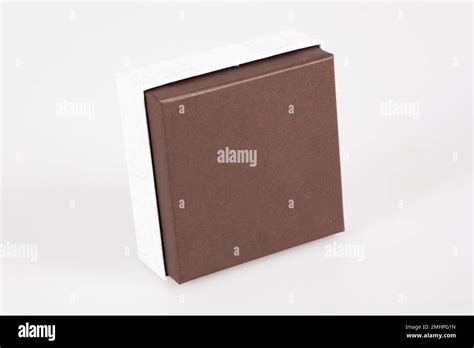 Single Simple Small T Box With Brown Cower In Grey Background Stock