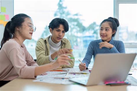 Team Of Ux Developer And Ui Designer Brainstorming Interface Wireframe Design Creative Digital