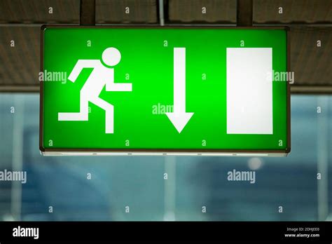 Lit Emergency Exit Sign Stock Photo Alamy