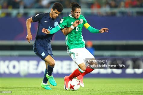 Dominic Solanke Of England And Alan Cervantes Of Mexico Battle For