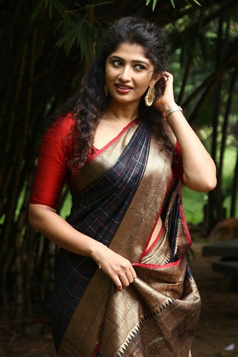 Roshini Prakash Saree Stills At Jada Movie Audio Launch