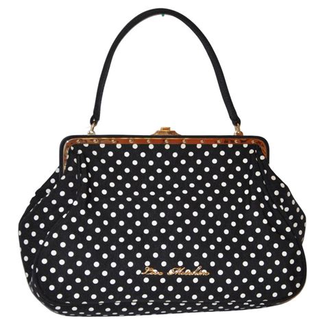 Moschino Black With White Polka Dot And Gilded Gold Hardware Accent