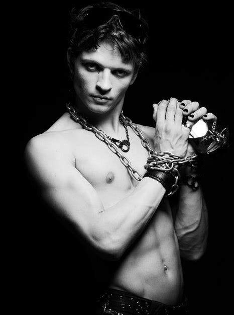 Premium Photo Fetish Man Over Dark Background