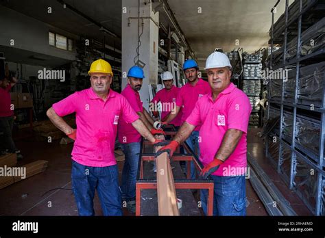 Workers Packing Cardboard Box In Warehouse For Shipment An Operator