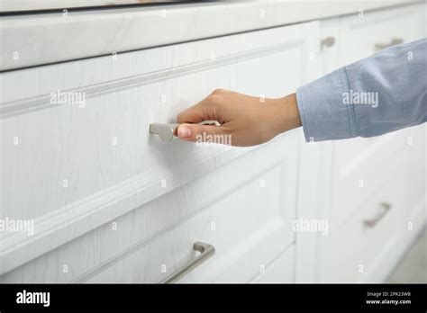 Hand Pulling Drawer Open Hi Res Stock Photography And Images Alamy