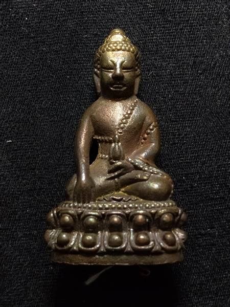 พระกริ่งหลวงพ่อคูณ รุ่น มหามงคล ออกวัดบ้านไร่ ปี 57 เนื้อ นวะก้นอุดมวลสาร เกศา จีวร หลวงพ่อ