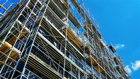 Modern Scaffolding Structure Under Clear Blue Sky Stock Illustration