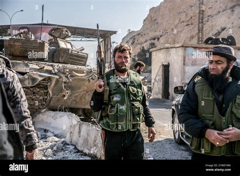 An Armed Man Poses In Syria Close To The Border With Lebanon