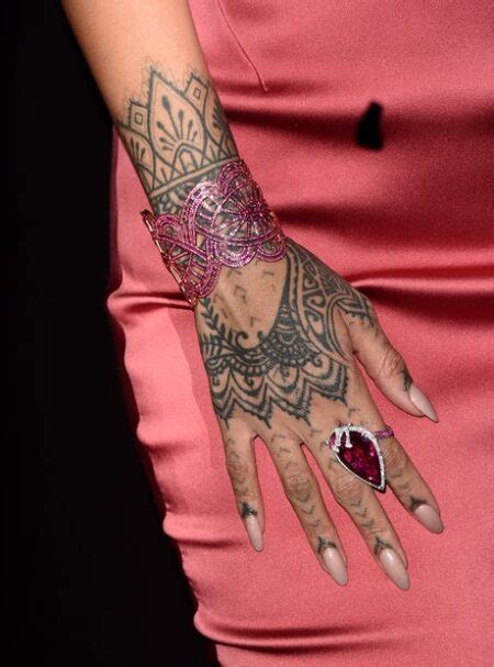 The Hidden Meanings Behind Rihannas Most Iconic Tattoos Tattooed Images