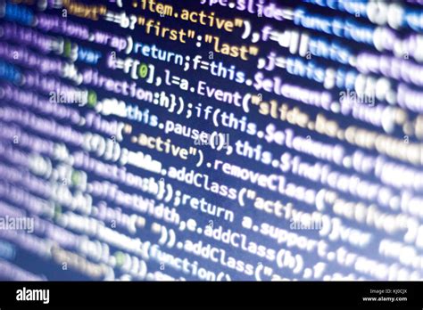 glowing minificated javascript code abstract screen of modern web