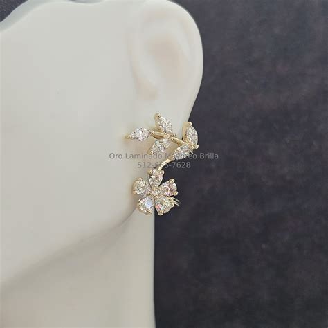 Arete Trepador Flor En Oro Laminado Climber Flower Earring In