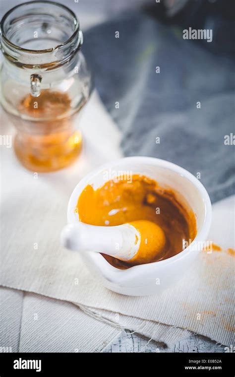 Mixing Turmeric Powder With Honey For Turmeric Tea Stock Photo Alamy