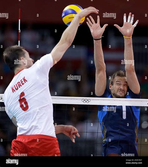 Polands Bartosz Kurek Left Spikes The Ball Past Italys Michal Lasko