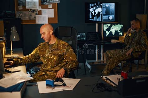 Analyzing Data In Military Command Center Setting Stock Image Image Of Operation Coordination
