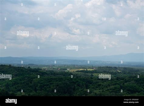 Sun Spot On Landscape Against Hill Layers In Mist Hilly Landscape With