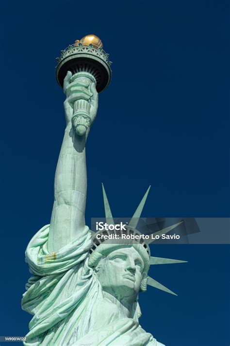Closeup Of The Crown The Arm And The Torch Of The Statue Of Liberty New