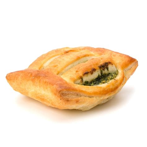 퍼프 페이스트리 시금치를 곁들인 건강 페이스트리 프리미엄 사진