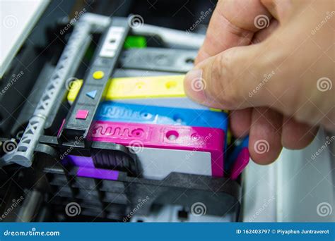 Technicians Are Install Setup The Ink Cartridge Of A Inkjet Printer The