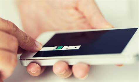 Close Up Of Woman With Smartphone Doing Blood Test ICT Health Official Platform For
