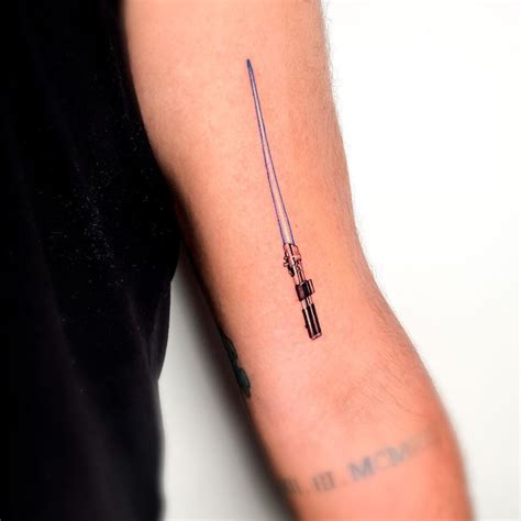 50 Striking Lightsaber Tattoo Ideas For Star Wars Fans