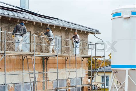 Plaster Worker On Scaffold Working Stock Image Colourbox