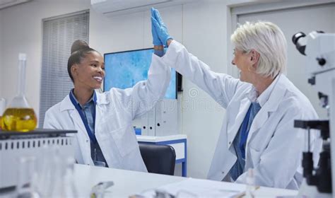 high five teamwork or doctors for success research medicine