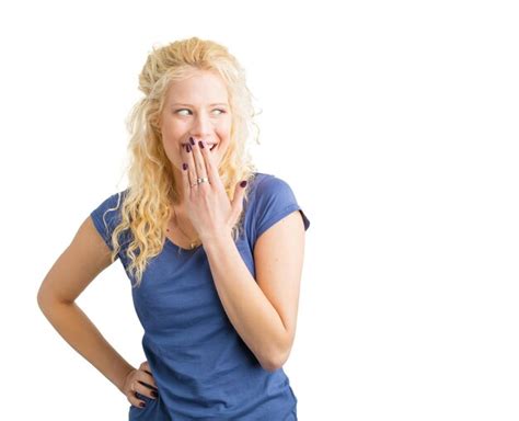 Premium Photo Woman Giggling With Her Arm In Front Of Mouth