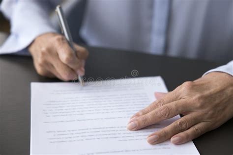 Older Female Signing Business Document Close Up View Stock Photo Image Of Conditions