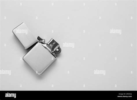 Gray Metallic Cigarette Lighter On White Background Top View Space For Text Stock Photo Alamy