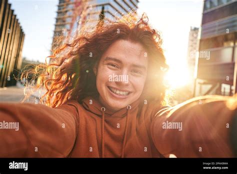Non Binary Gender Person Poses Cheerfully Photo Outside New