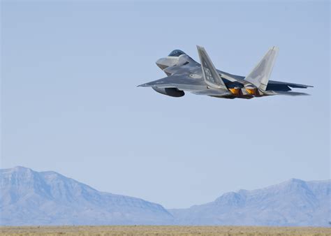 F-22s Take-Off to Complete Phase 1 Exercise