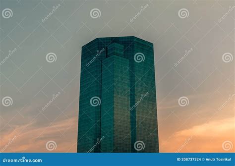 Angular Geometric Mirror Cladding On A Modern Building With Repeating Structure And Reflected