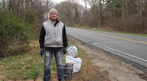 A Woman Driving Down The Road Noticed Lines Of Full Trash Bags On The