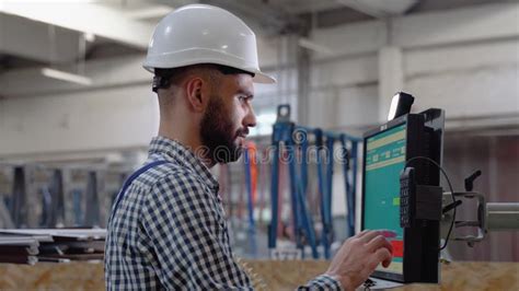 Industrial Programmer Checking Control Box Status With Computer Stock