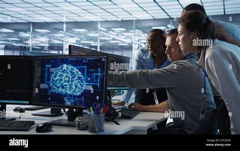 Engineer Calling Colleagues After Finding Error In Code While Doing Checkup On Server Room Used