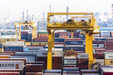 View Of The Container Terminal With Stored Containers And Terminal Equipment In Sea Port Of