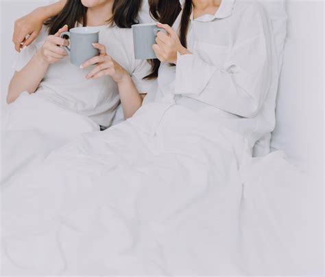 Premium Photo Happy Young Lesbian Couple Taking Selfie Together
