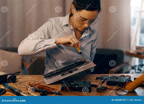 Computer Technician And Woman Repairing Motherboard It Management And Hardware Engineer With